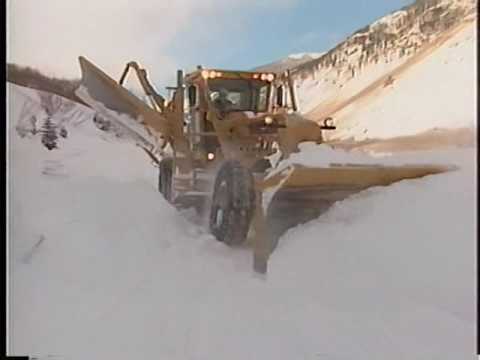 Using a Reversible Front Snow Plow - YouTube