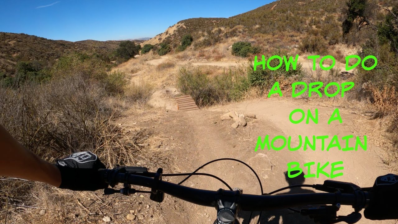 MTB 101: How to go off a drop on your mountain bike! - YouTube