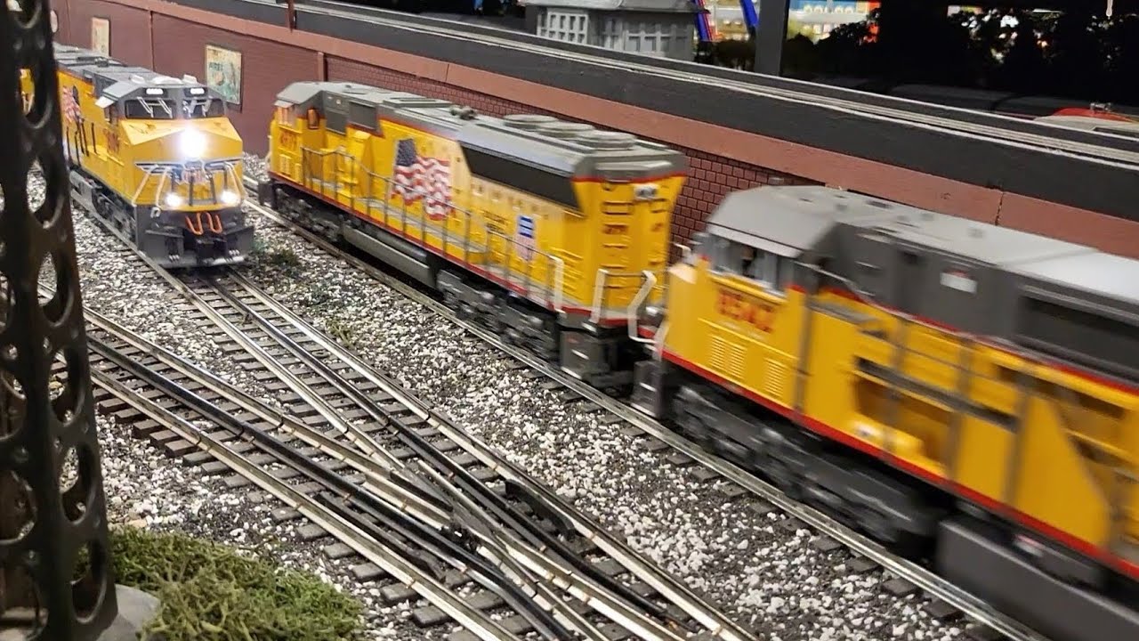 2 Union Pacific Trains meet on Corner Field Model Railroad Museum - YouTube