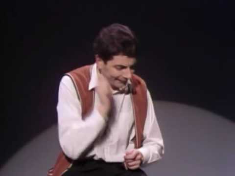 Rowan Atkinson Live Star of Mr Bean Funny invisible drum kit sketch ...