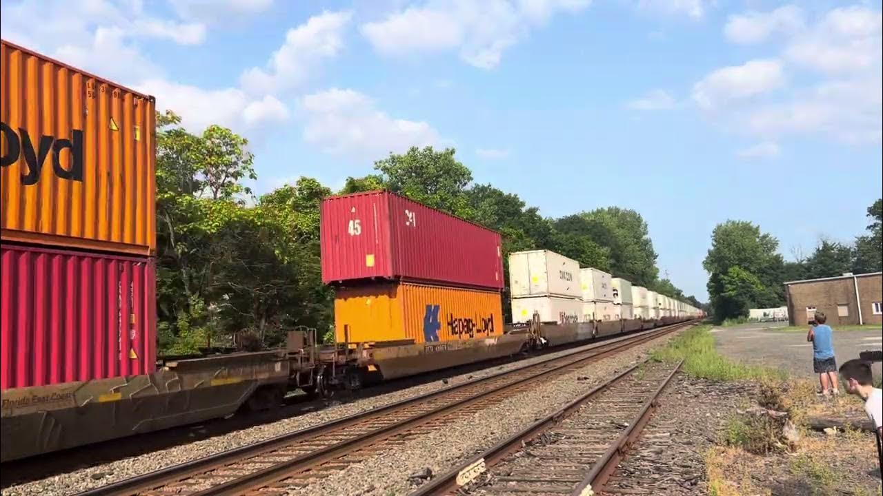 NS 4281 AC44C6M leads NS 269 through south Plainfield - YouTube