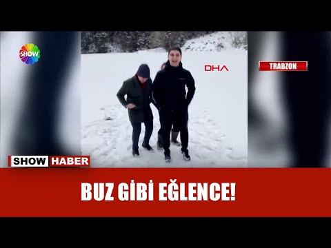 Buz tutan derede zıplayınca suya gömüldüler!