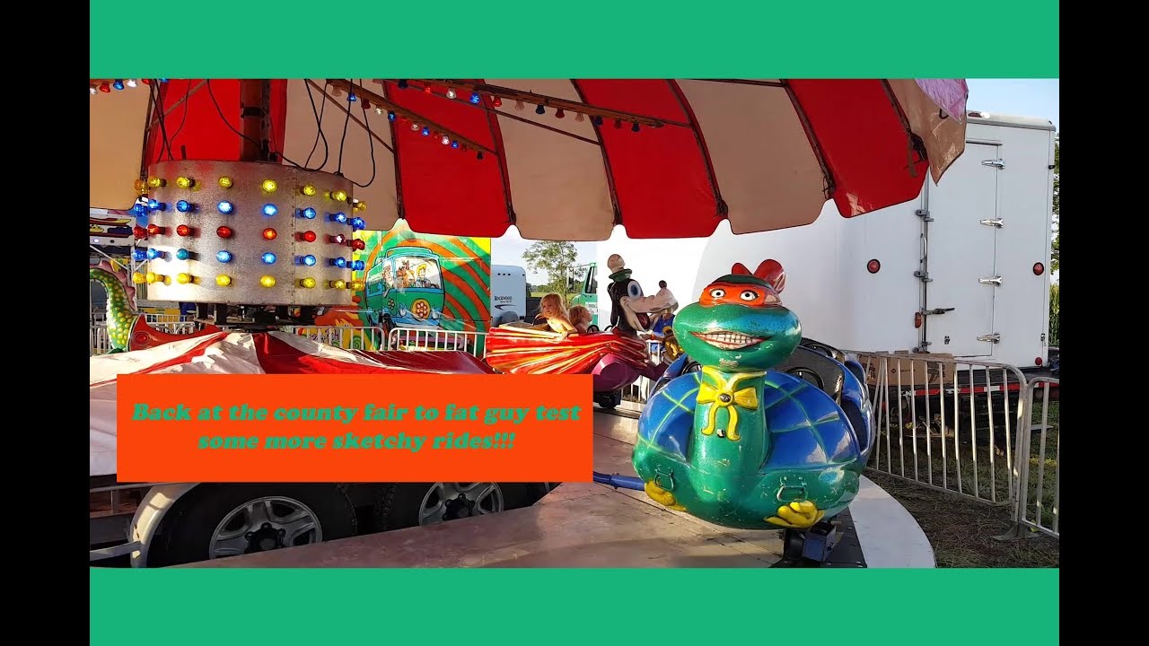 Back at the County Fair to fat guy test some more sketchy carnival ...