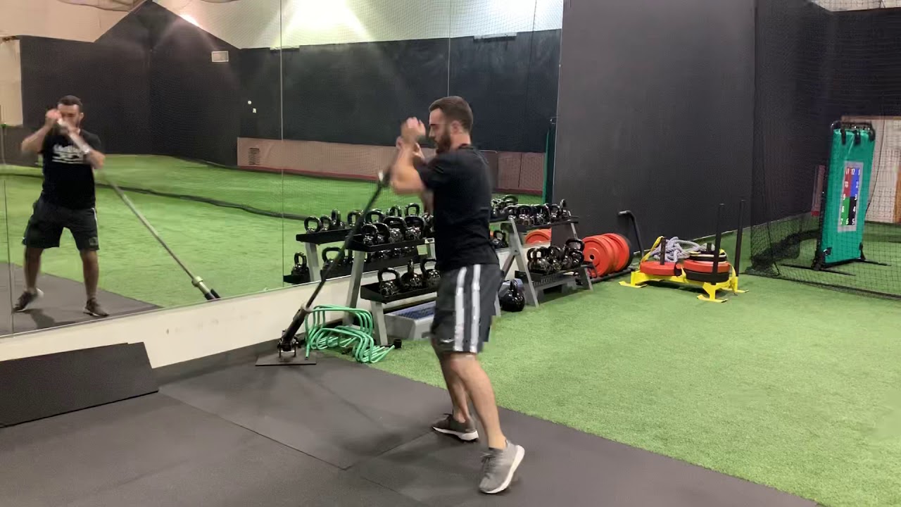 Split-Stance Rotational Landmine Press - YouTube