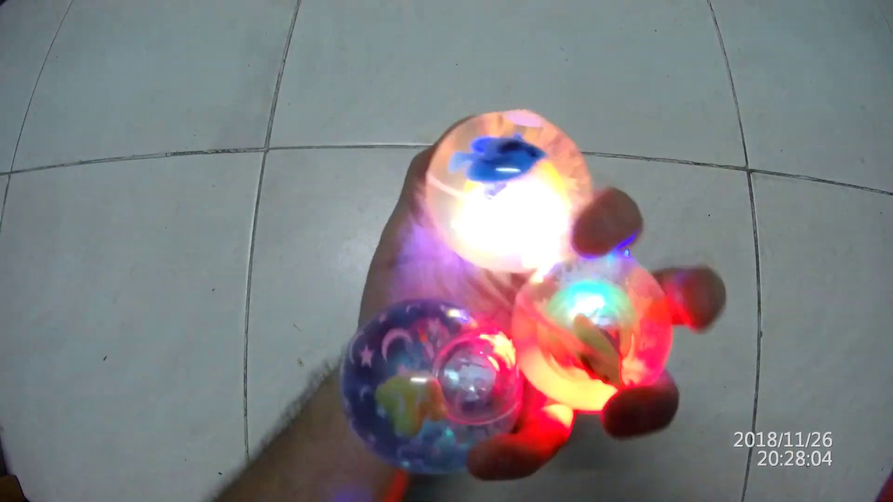 Flashing LED clear toy plastic bounce balls 2.5k 1440p 60fps - YouTube
