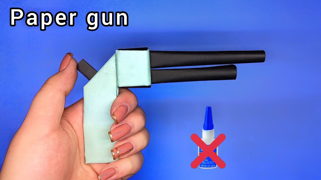 Origami gun easy | How to make paper gun no glue | paper magnum - YouTube