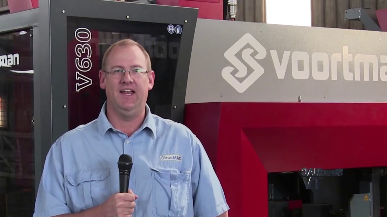 StrucMAC's brand new Voortman drill/saw beam processing line. - YouTube