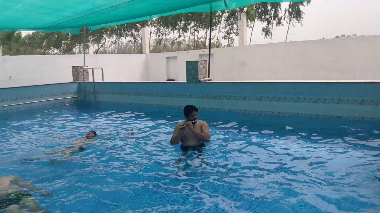 Flute performance in swimming pool. - YouTube