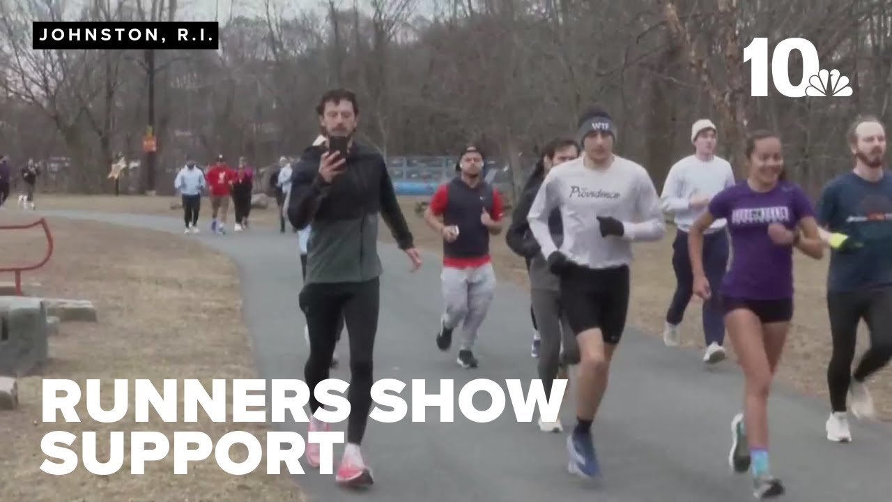 Runners support runner who reported body slam attack as police hold a ...