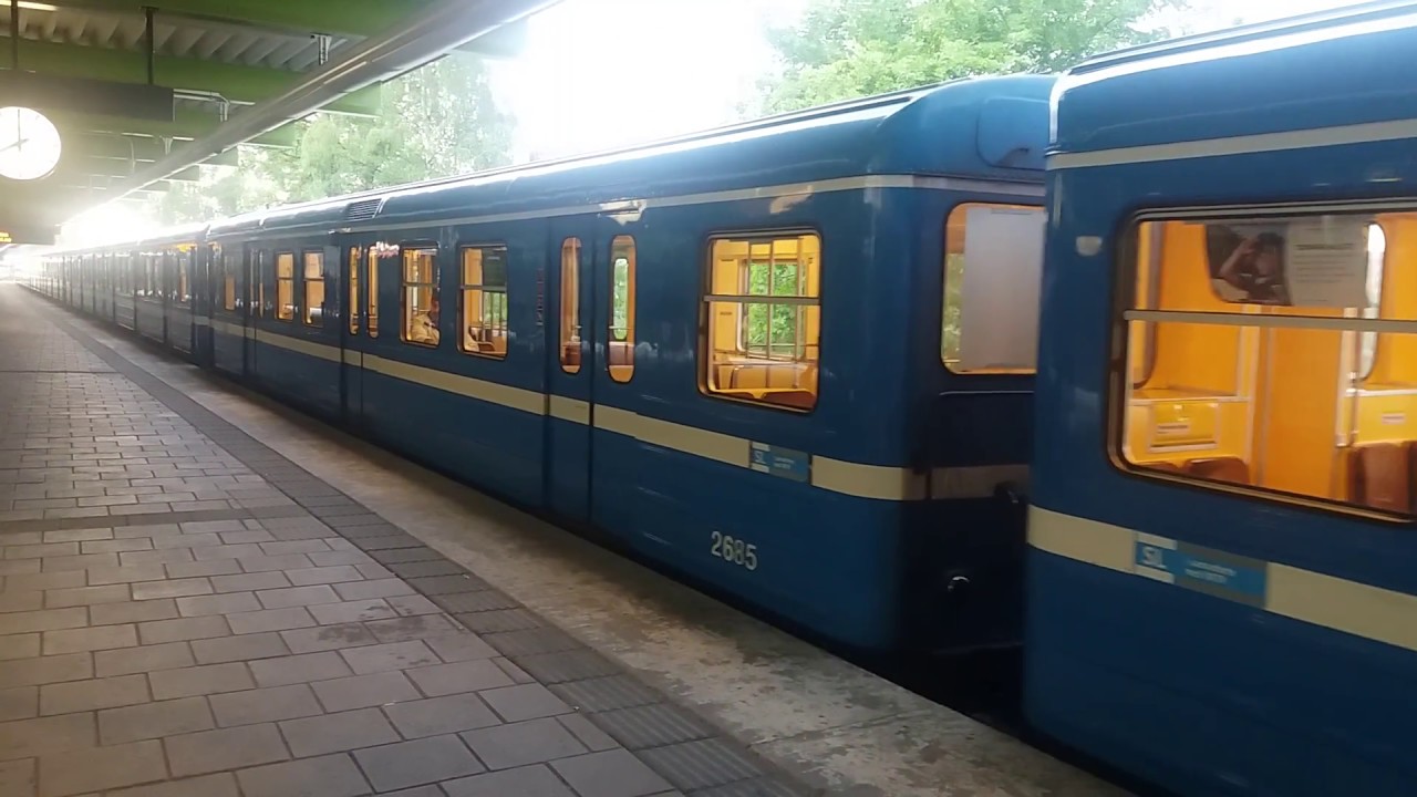 Stockholm subway C6 train with a C6H wagon departing from Hallunda ...