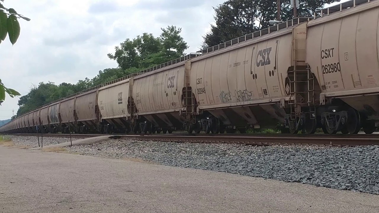 CSX unit covered hopper train northbound on track one with PRLX 9551 ex BN leading - YouTube