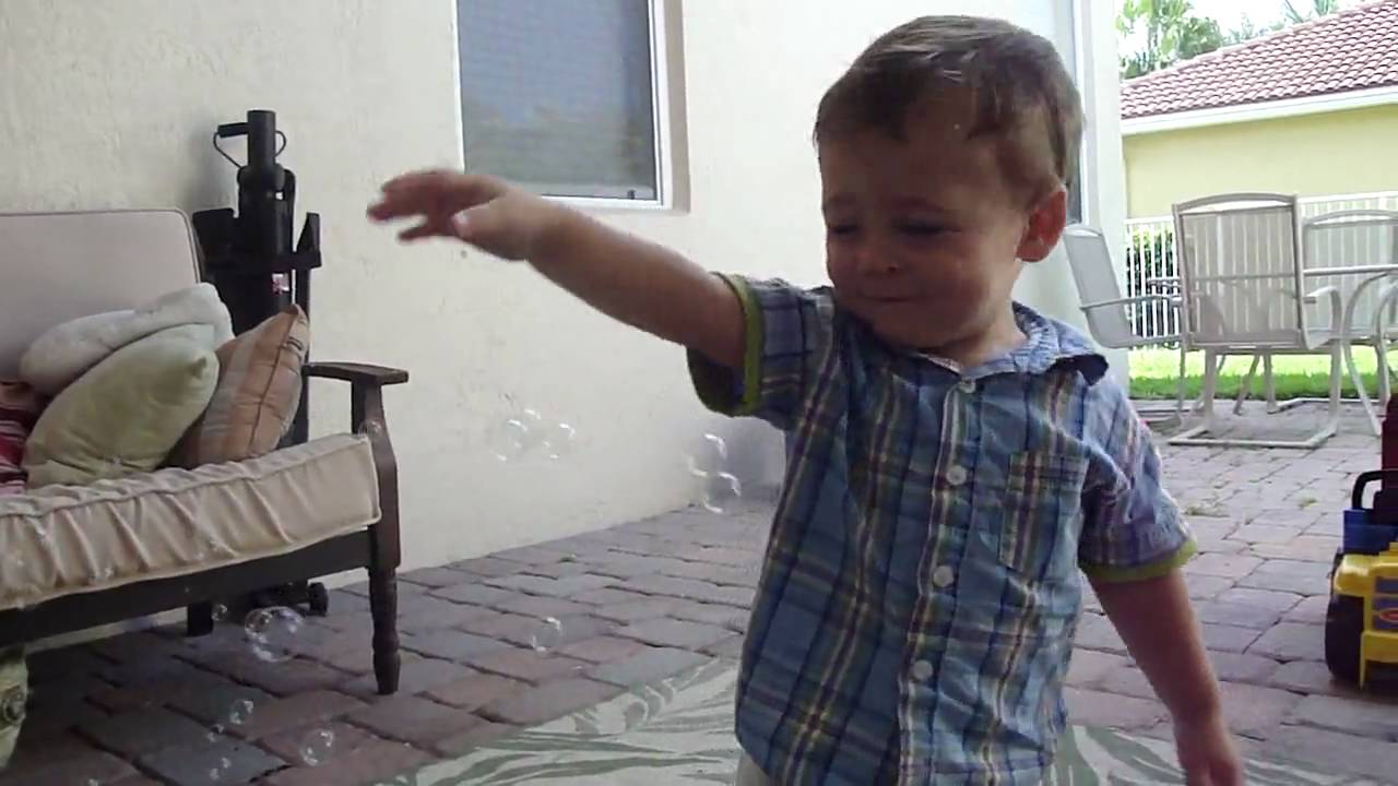 Caleb blowing bubbles! - YouTube