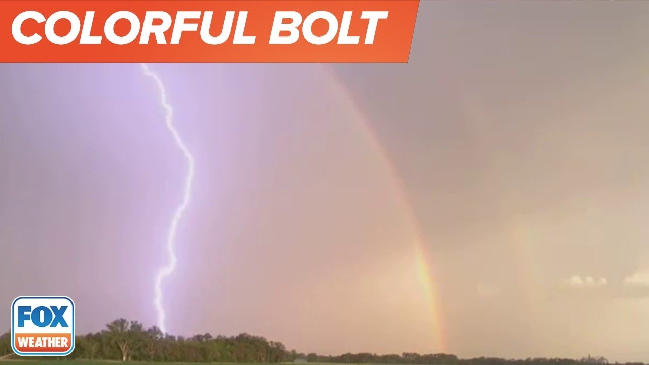 Watch: Lightning Strikes Next to Rainbow in Western Minnesota - YouTube