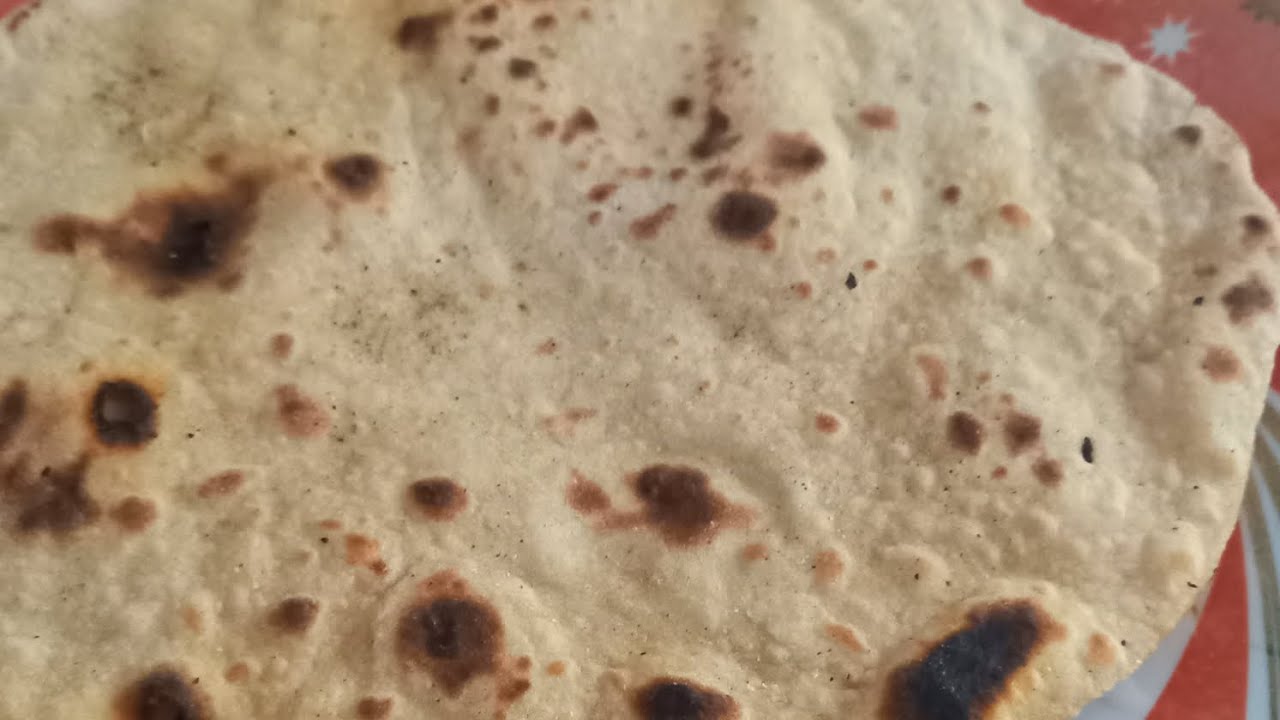 "Soft and perfectly puffed homemade roti! A staple of Indian cuisine ...