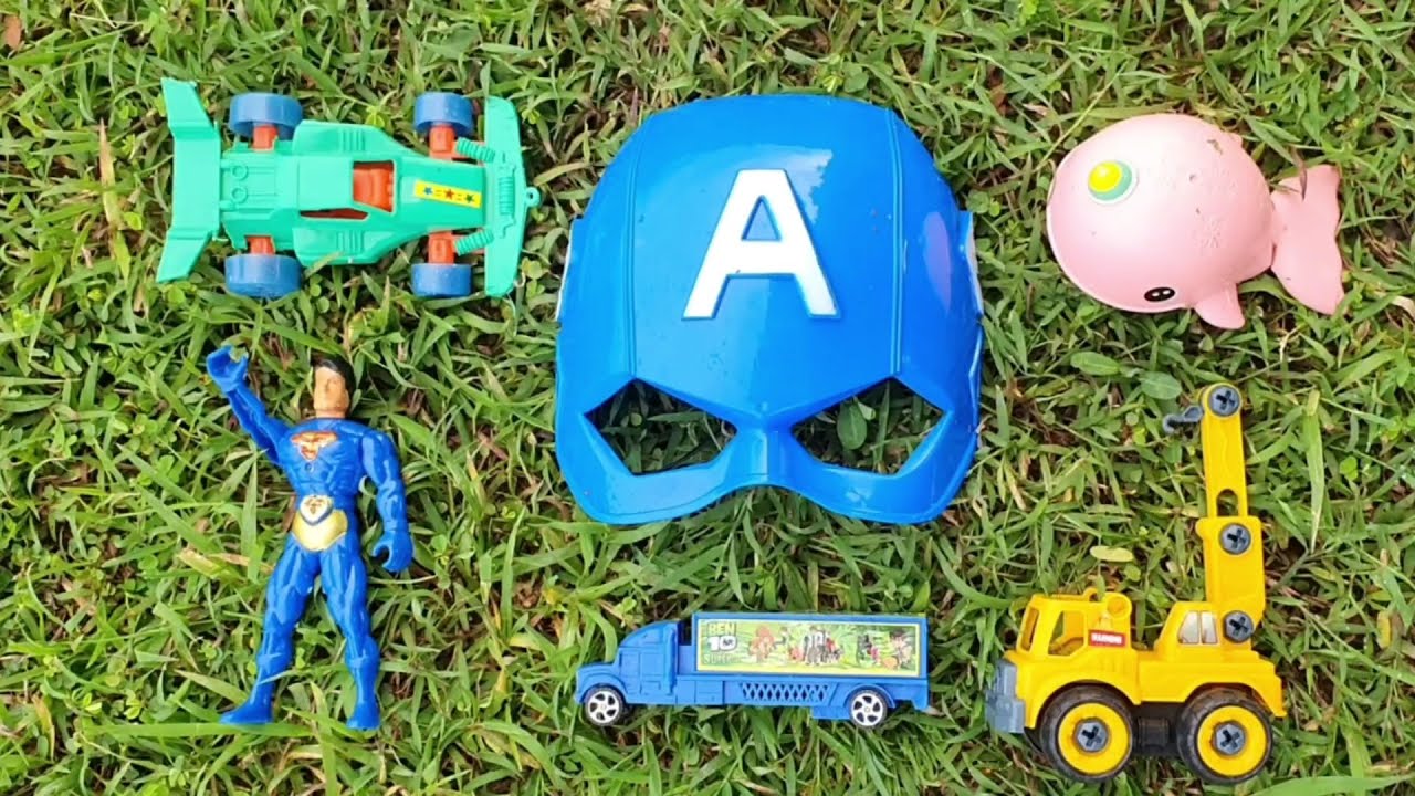 Mencari mainan tamiya, topeng captain america, ikan paus, superman ...