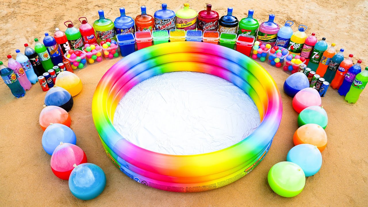 Experiment with Rainbow Pool: Giant Cola, Mtn Dew, Schweppes, Sprite ...