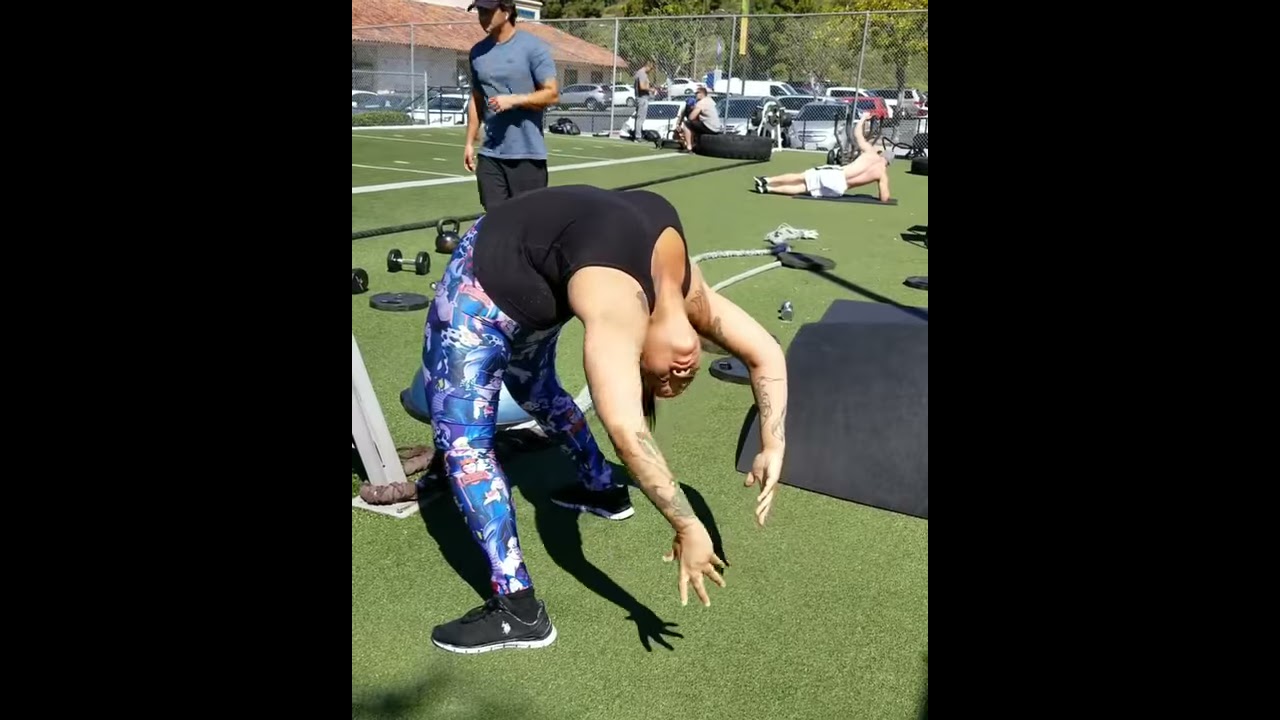 Contortion Backbend to grab ankles. Advanced at gym. Flexibility yoga ...