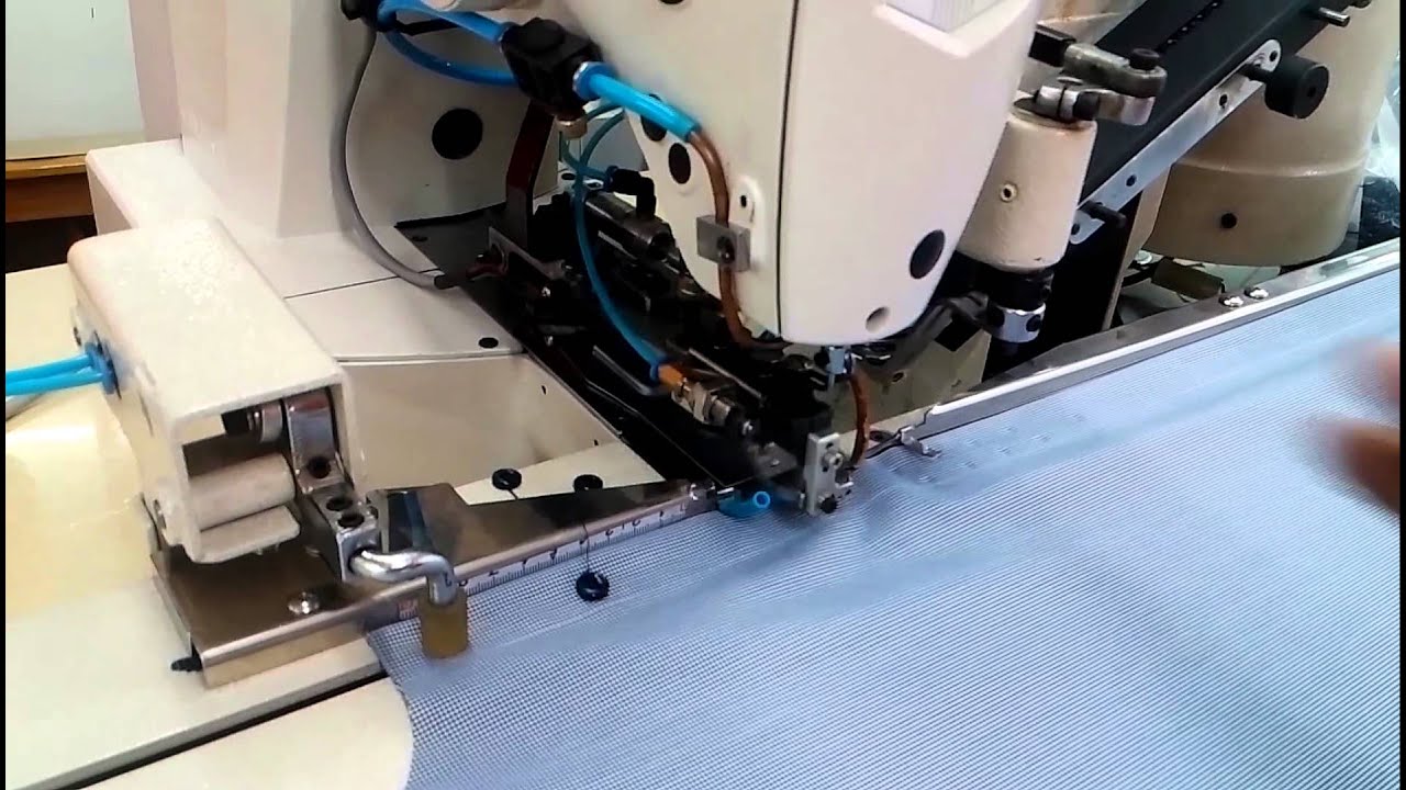 Auto button sewing machine - YouTube