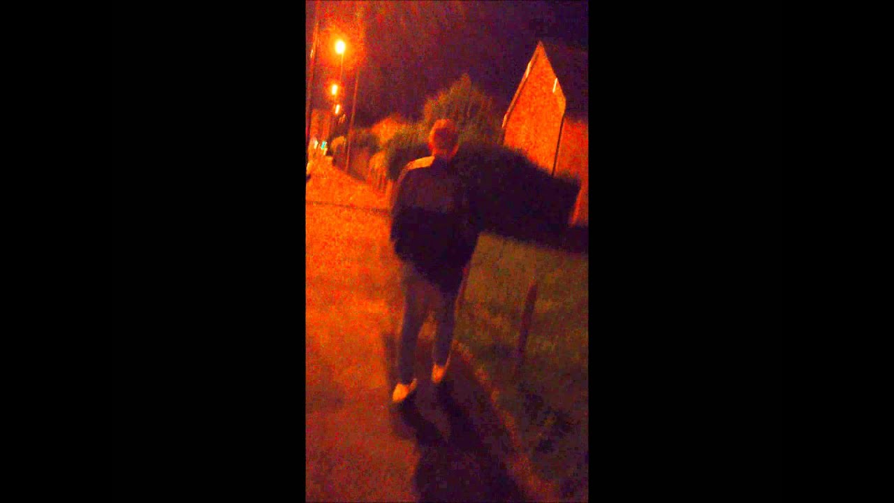 Drunk man falls over fence - YouTube