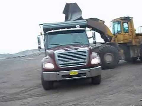 Trucks Hauling Slag - YouTube