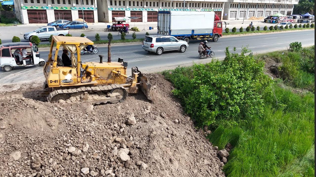 Awesome dozer uses ultimate pushing soil filling land powerfully - YouTube