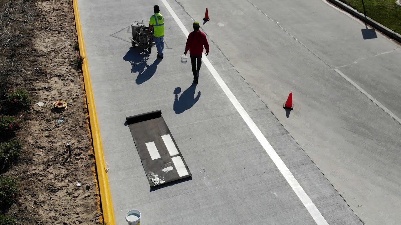 Alvarez Striping thermoplastic turn lane from above#2 - YouTube