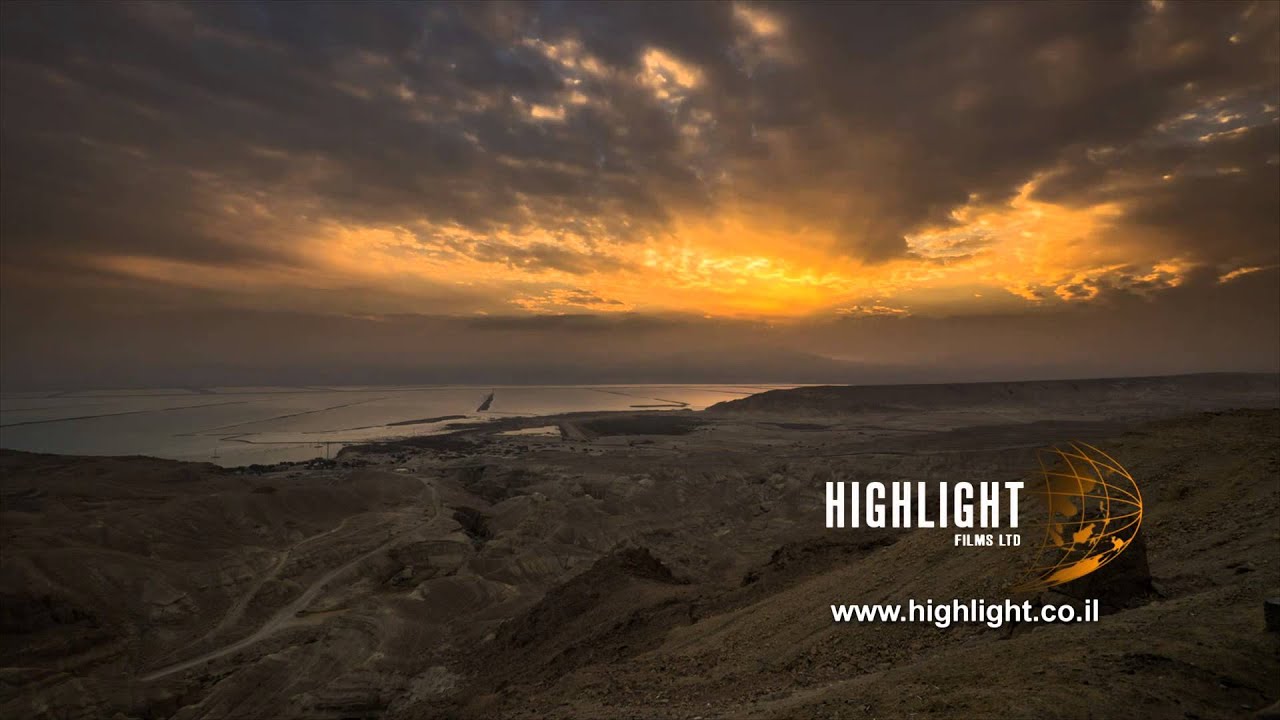 T4K 080 4K (UHD) time lapse sunrise shot of the Dead Sea, night to day ...