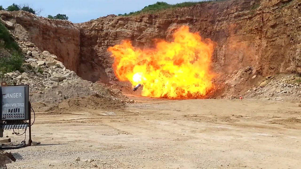 Crupp cannon firing at a propane tank - YouTube