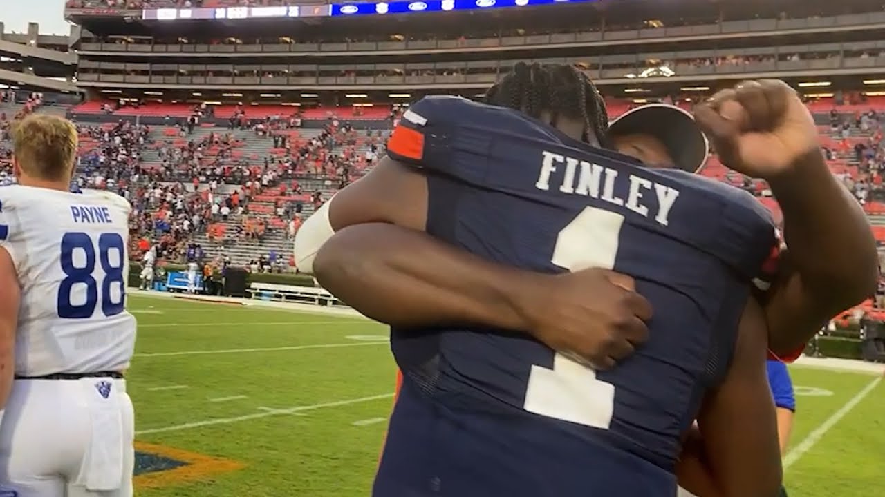 T.J. Finley celebrates with teammates following Auburn's 34-24 win over ...