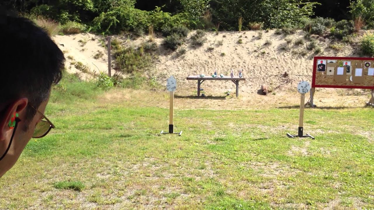 Scott Conti shoots bowling pins with the "Bowling Pin" 1911 - YouTube