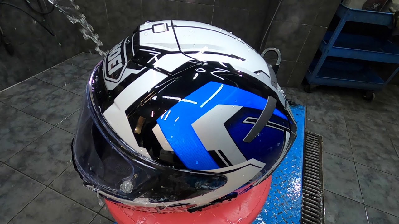 Helmet with ceramic coating water repellent test - YouTube