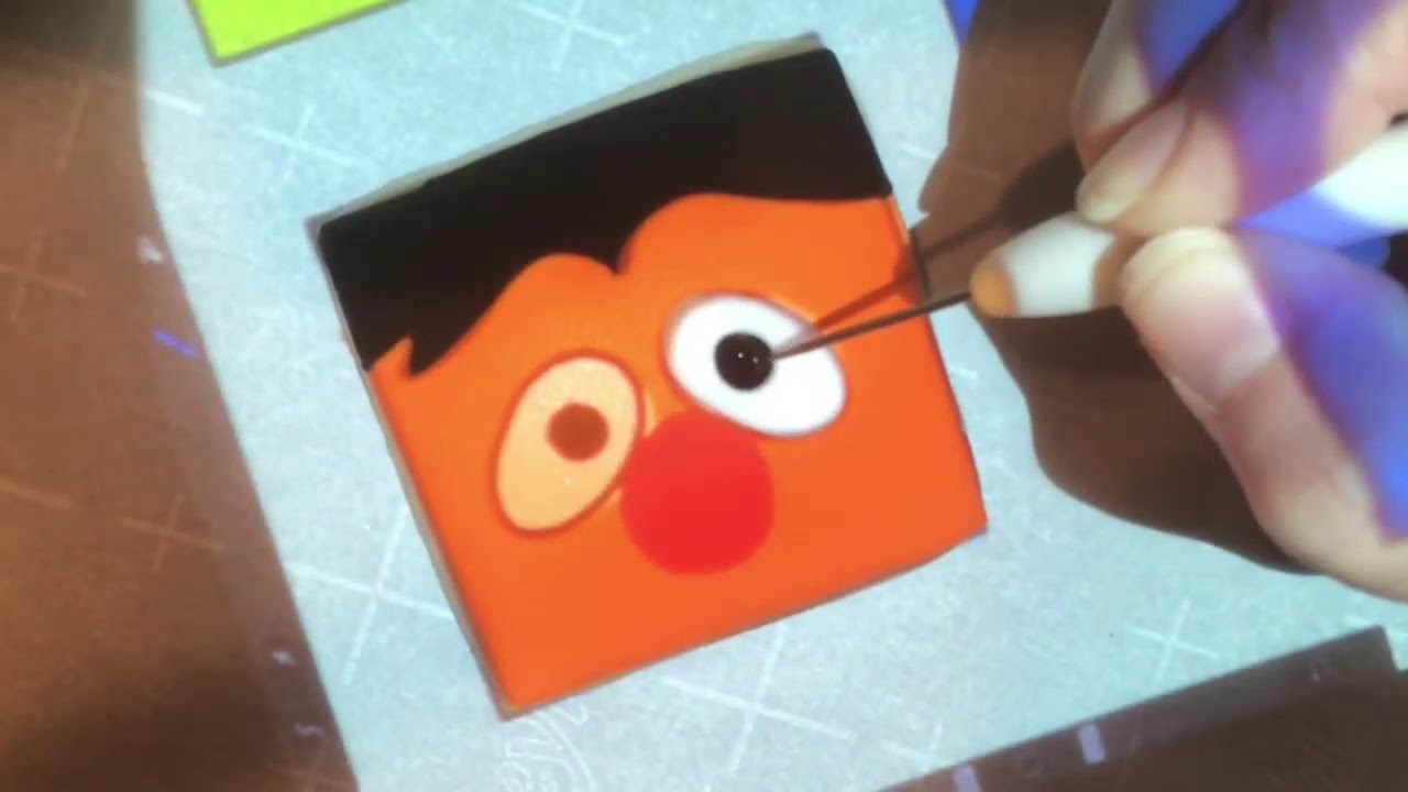 How to decorate Sesame Street Ernie cookie with royal icing - YouTube