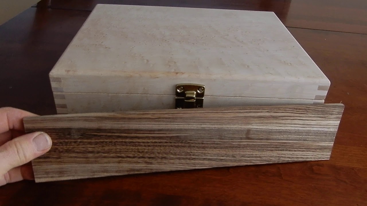 Finger jointed wood box of figured birdseye maple with hasp at lid ...