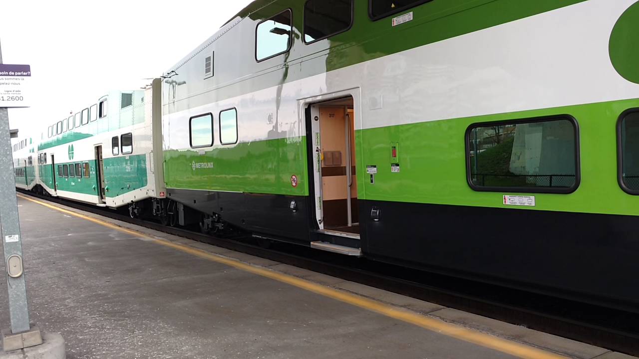 Go train with new cab car 317 departing Danforth station - YouTube