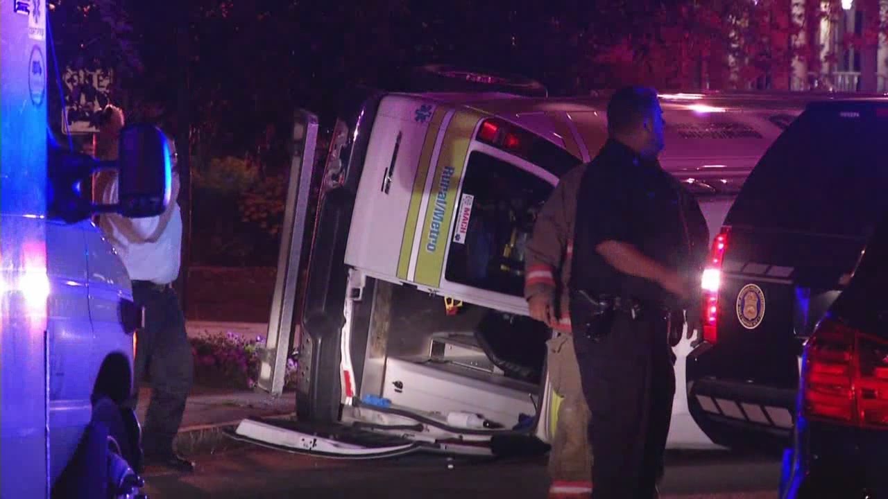 Ambulance flipped on its side near Women & Children's Hospital - YouTube