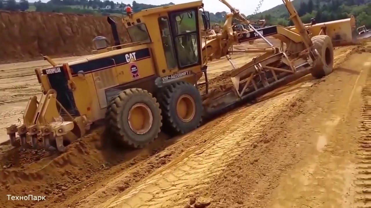 CAT 24M grader - YouTube