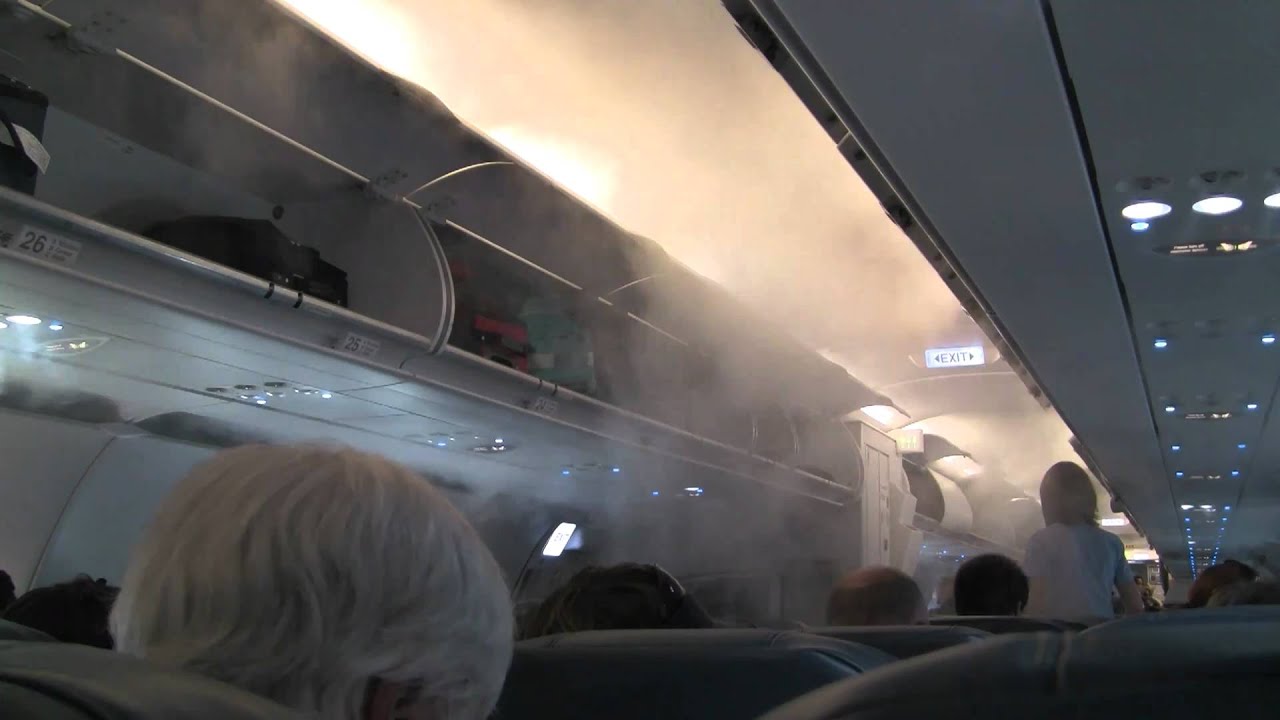 Humidity in the Air Makes A Plane Look Like It's on Fire - YouTube