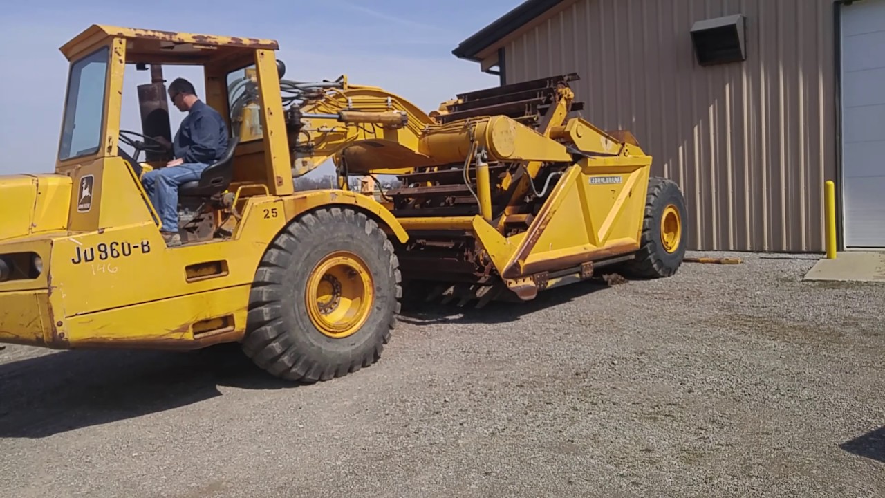 GovDeals: 860B John Deere Self Loading Scraper - YouTube