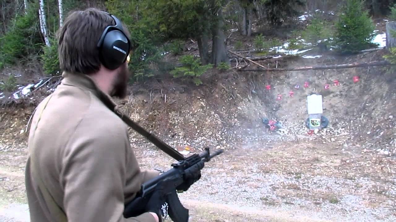 Rapid firing the M10-762 AK-47 rifle - YouTube