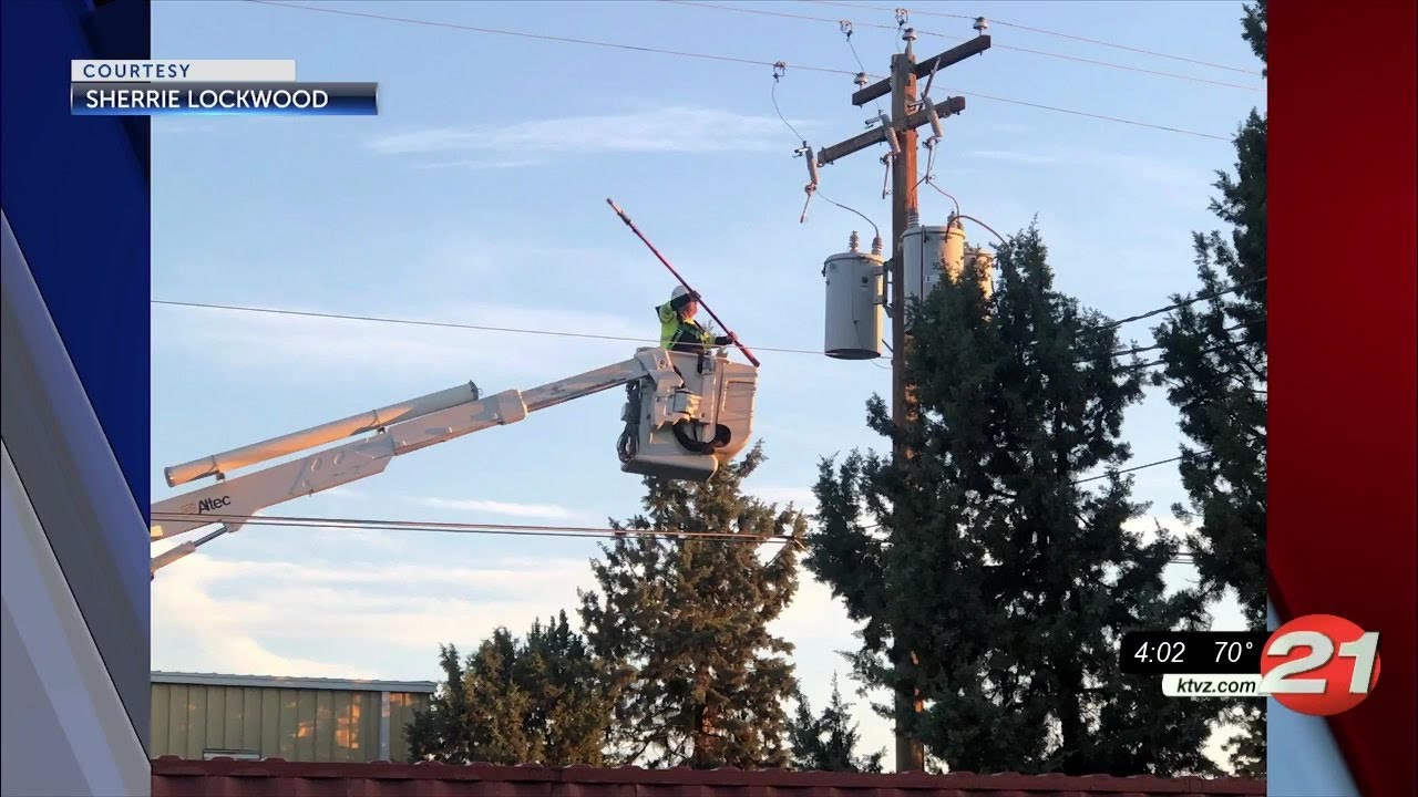 Bend garbage truck hits power line; driver calls for help - YouTube