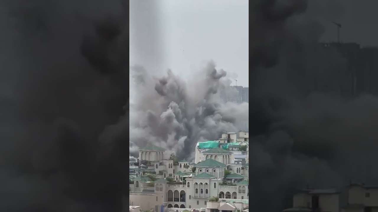 Twin tower waterfall demolished - YouTube