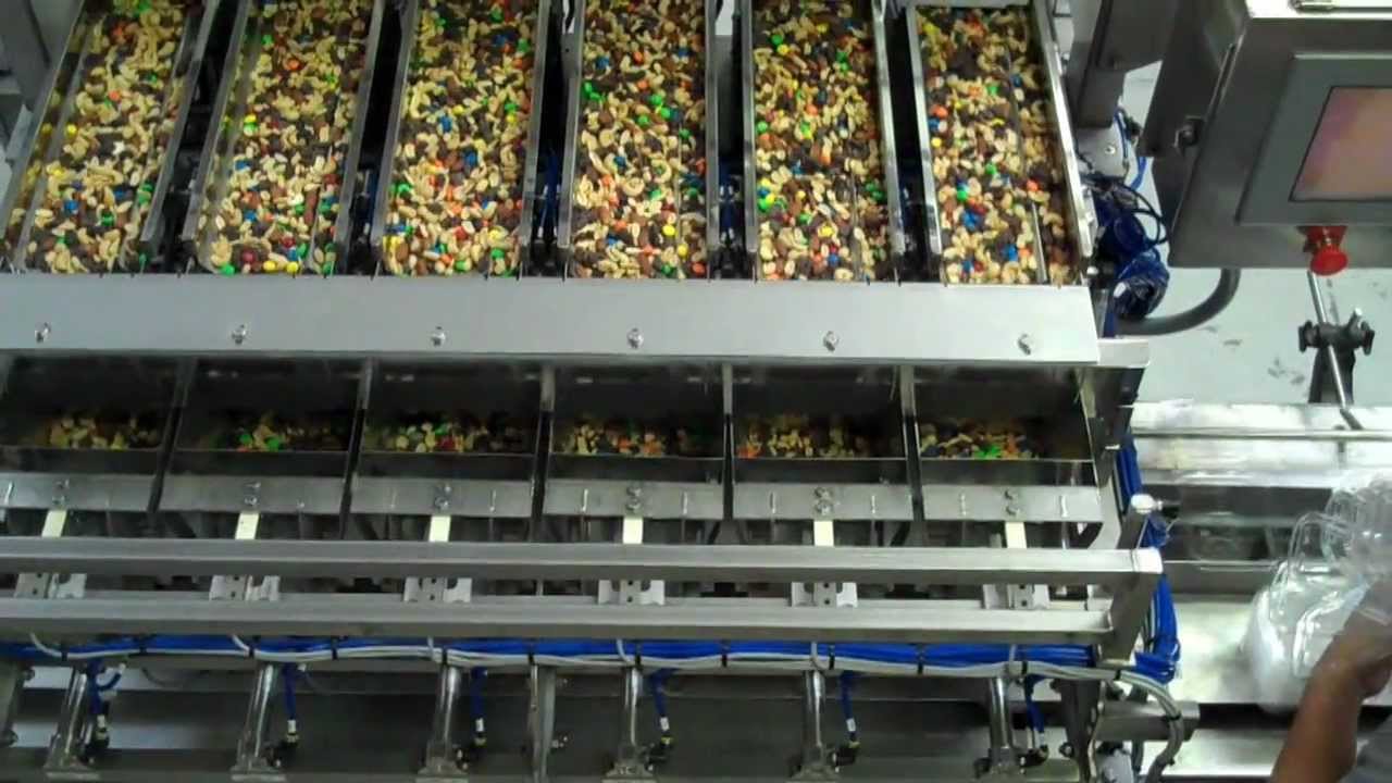 Clamshell Filling Trail Mix / Lakewood Process Machinery - YouTube