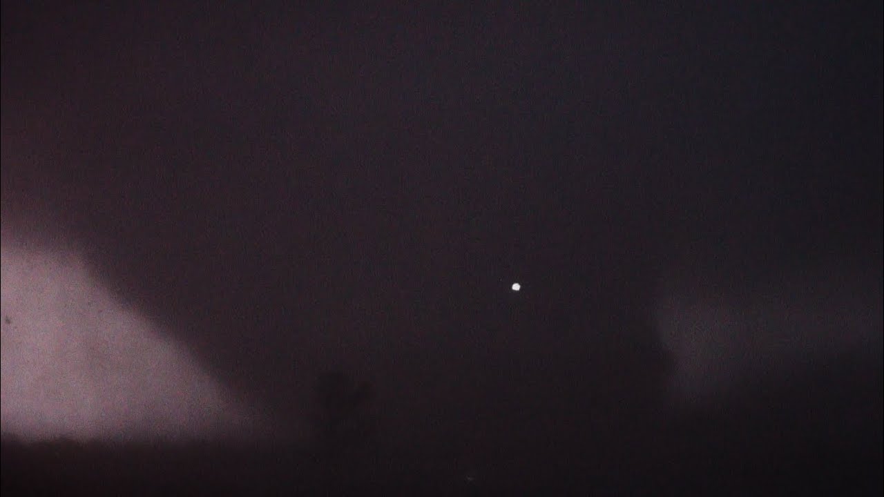 Mystery Light Orbiting Tornado (Car Headlights?!?) - YouTube