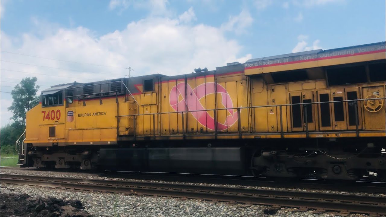 UP 7400 (PINK RIBBON) UNIT LEADS CSX K594!! - YouTube