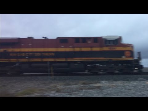 KCS 4844 leads a mixed freight train plus a DPU! - YouTube