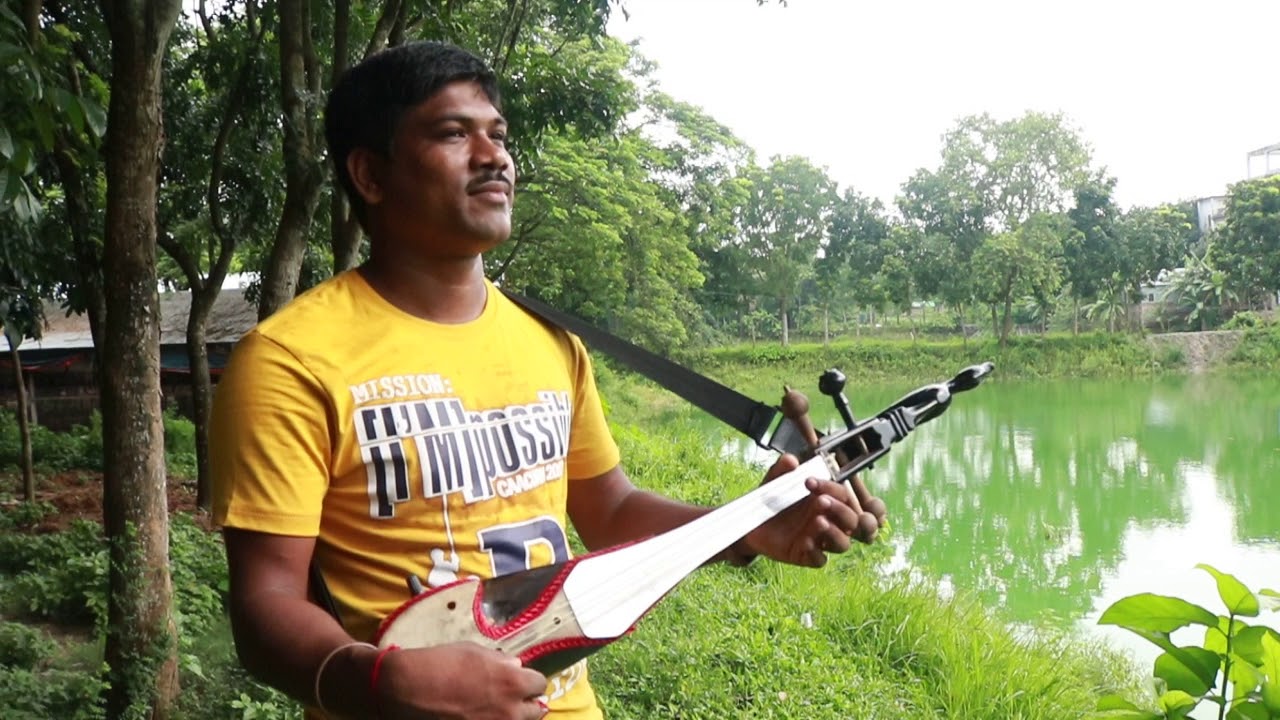 Dotara babu playing dotara | awesome sound dotara | Daulatdia - YouTube
