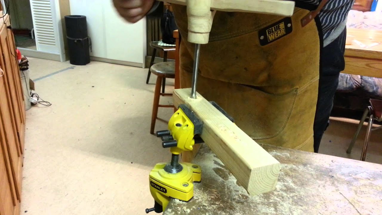 Drilling with a wooden viking style chest drill and spoon bit - YouTube