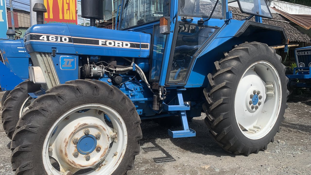 Máy cày Ford 4610 2 cầu . Có cabin máy lạnh đầy đủ . Xe zin từ trong ra ...