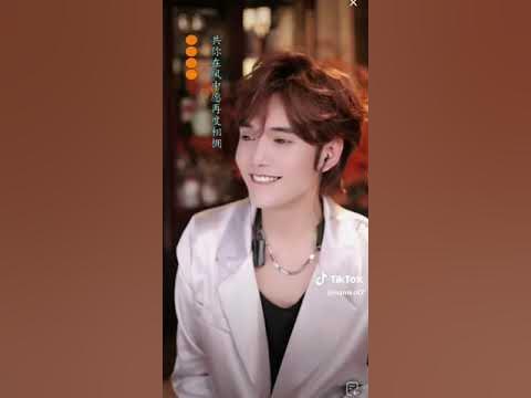 Wu Zhigang covers 相逢在雨中 - YouTube