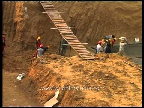 Building and Construction Labourer working on a construction site - YouTube